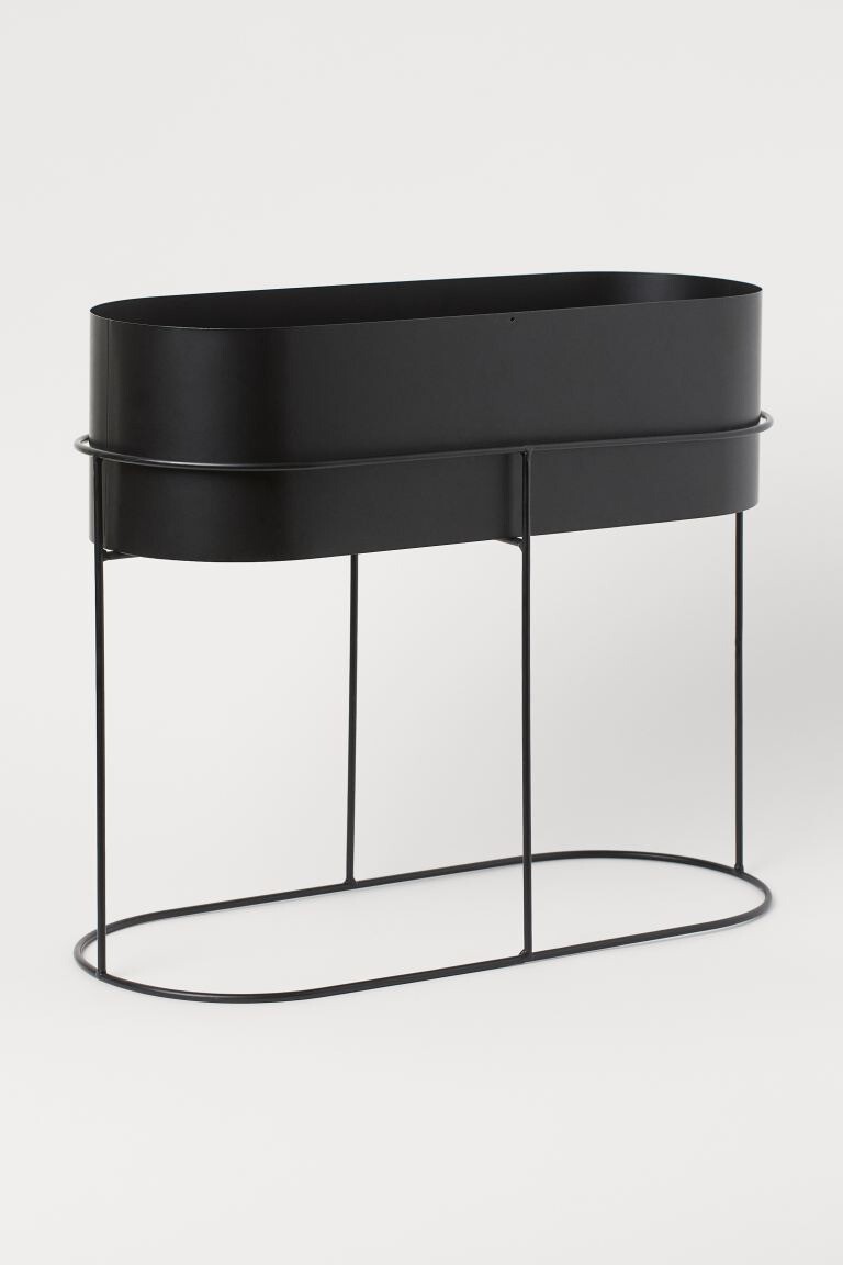 Seis maceteros con pies para dar altura a las plantas de interior y ...