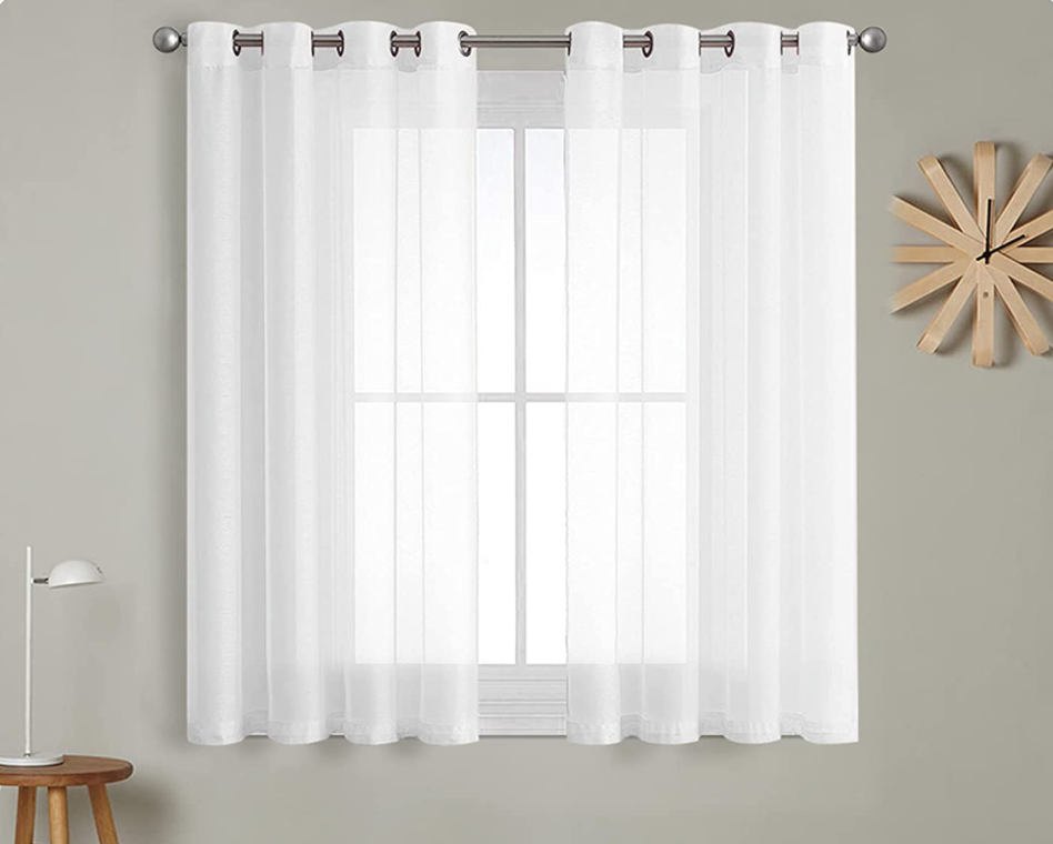 Seis cortinas elegantes y minimalistas para vestir de otoño nuestro salón