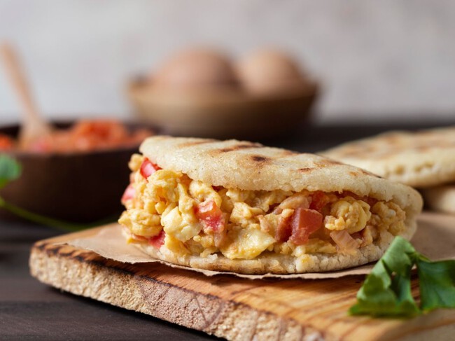 De la reina pepiada al tumbarrancho: los rellenos de arepas más ...