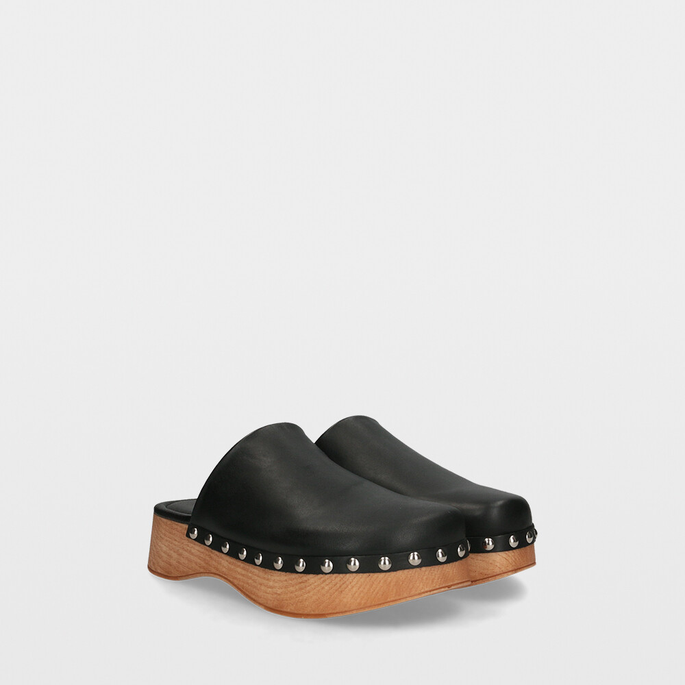 Con jeans o con vestidos: los zuecos son el calzado perfecto para el ...